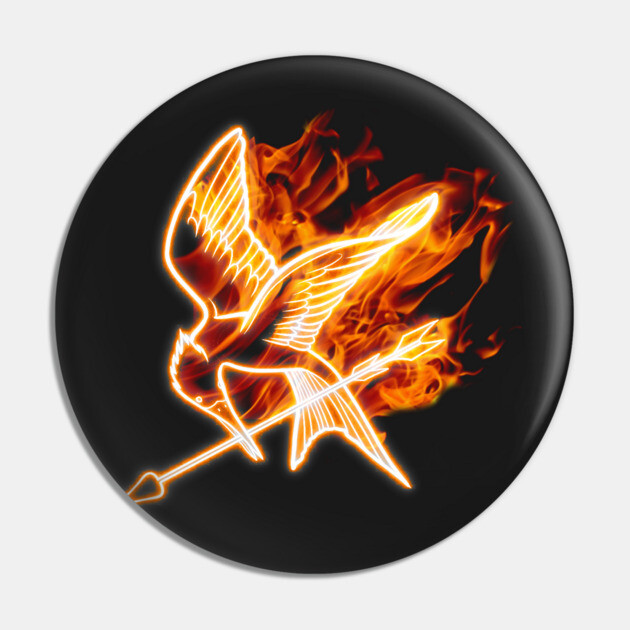 mockingjay pin on fire