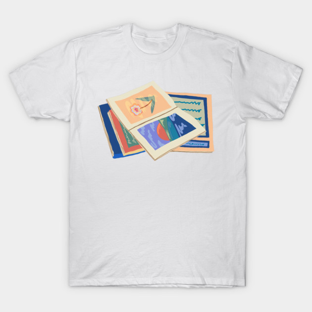 books spread open - Art Book - T-Shirt | TeePublic