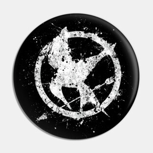 mockingjay pin black background